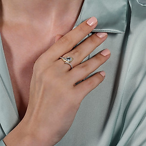 Jewelili Enchanted Disney Fine Jewelry 10K Yellow Gold 1/6 Cttw Diamond and Swiss Blue Topaz Jasmine Peacock Feather Ring Size 8