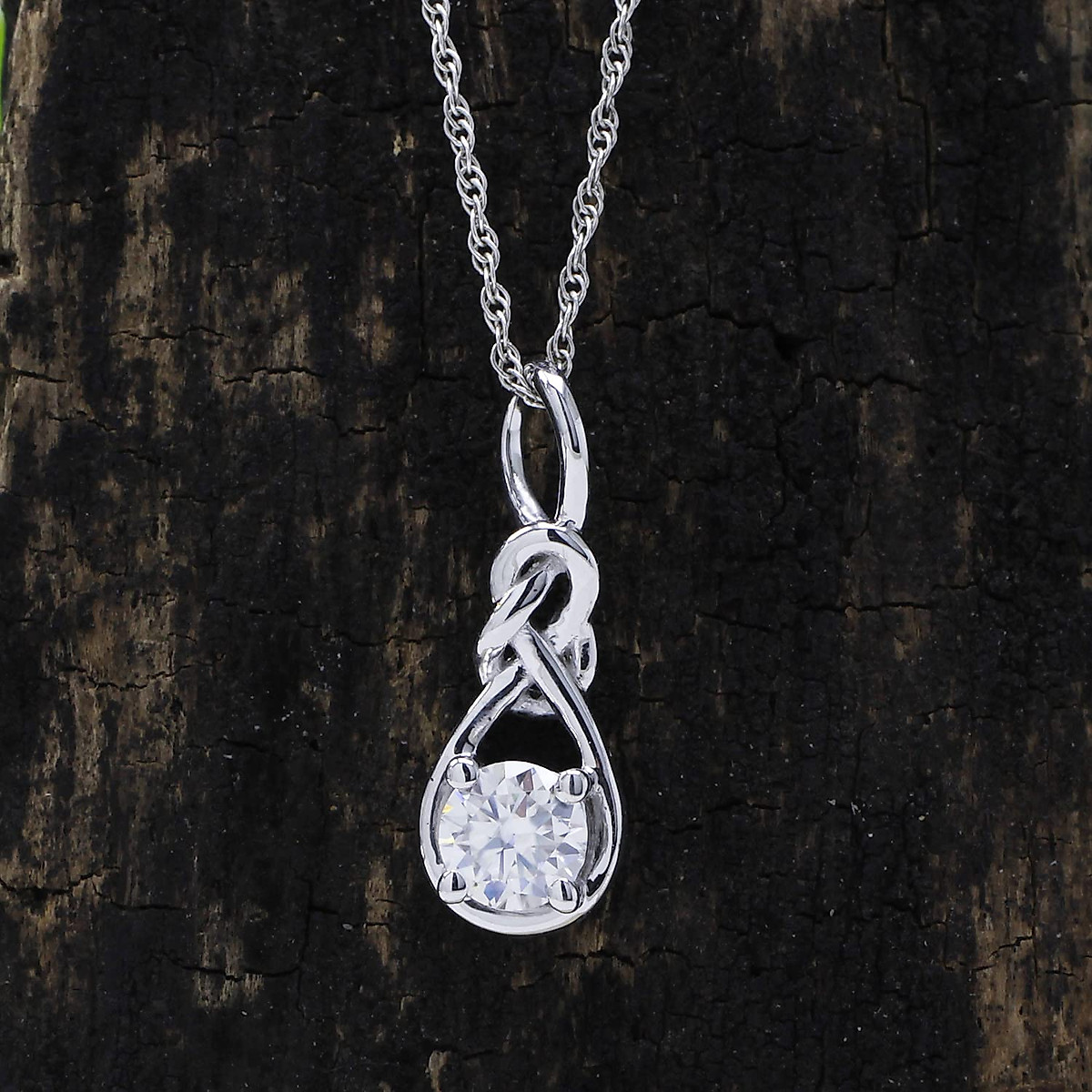 SAVEARTH DIAMONDS 1/2 Carat Round Cut Lab Created Moissanite Diamond Love Knot Solitaire Pendant Necklace In 14k White Gold Over Sterling Silver With 18" Chain (VVS1 Clarity, 0.50 Cttw)