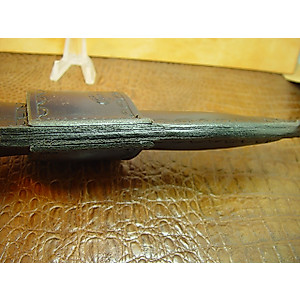 Custom cross draw knife sheath for the buck Selkirk knife. The sheath is made out of water buffalo hide leather Black.