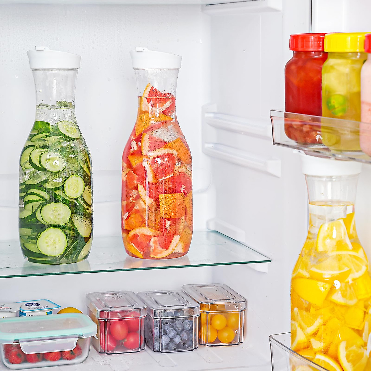 Tomnk 50oz Plastic Pitcher with Lid, Round Carafe Pitcher for Water, Cold Tea, Juice, Milk, Cold Brew, Mimosa Bar and Other Drinks, 2 Pack