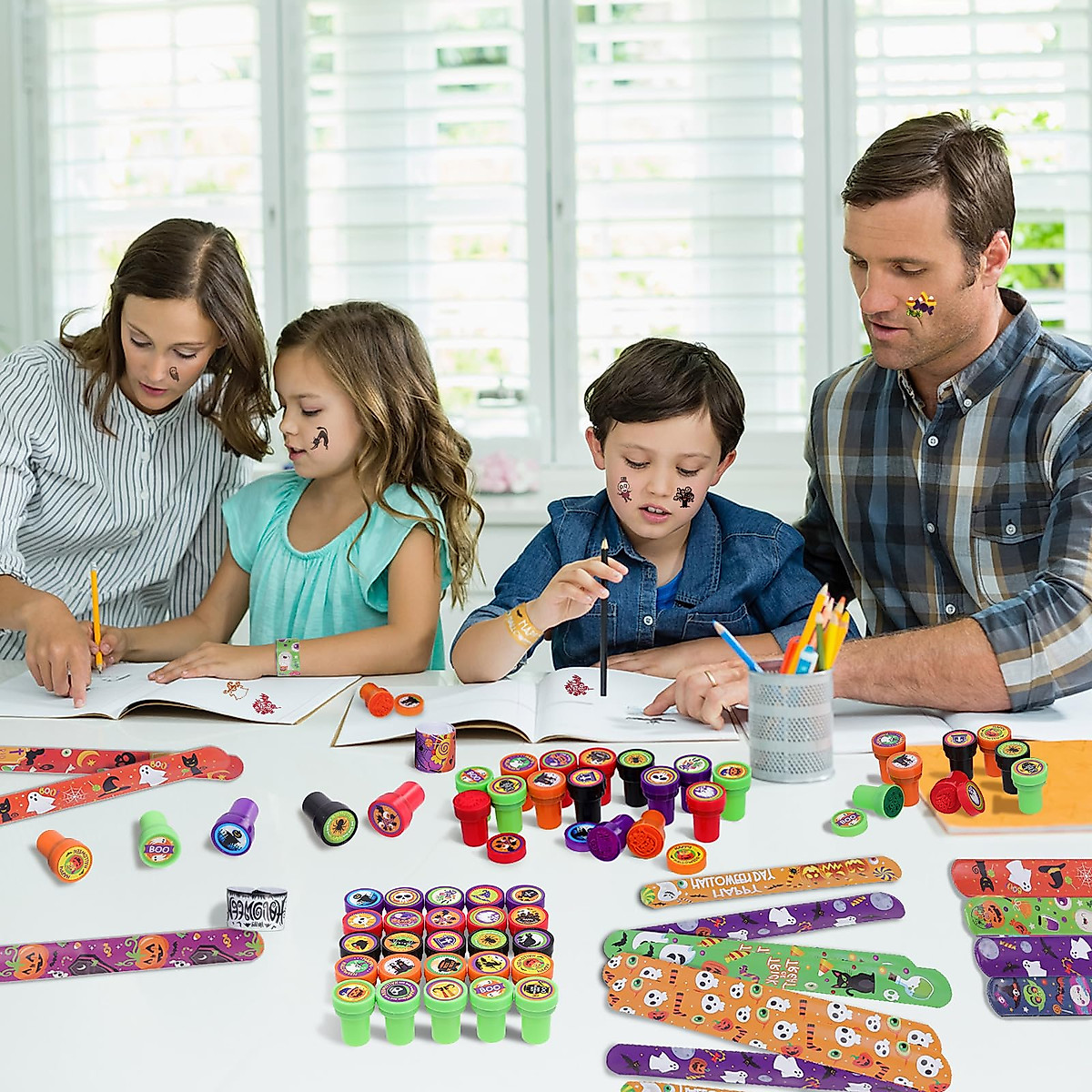 Garma Halloween Party Favors Toys for Kids, 25 Pcs Halloween Assorted Stamps with 12 Pcs Slap Bracelets and 288 Tattoos Halloween Goody Bag Fillers for Classroom Reward Prize Non Candy Party Supplies