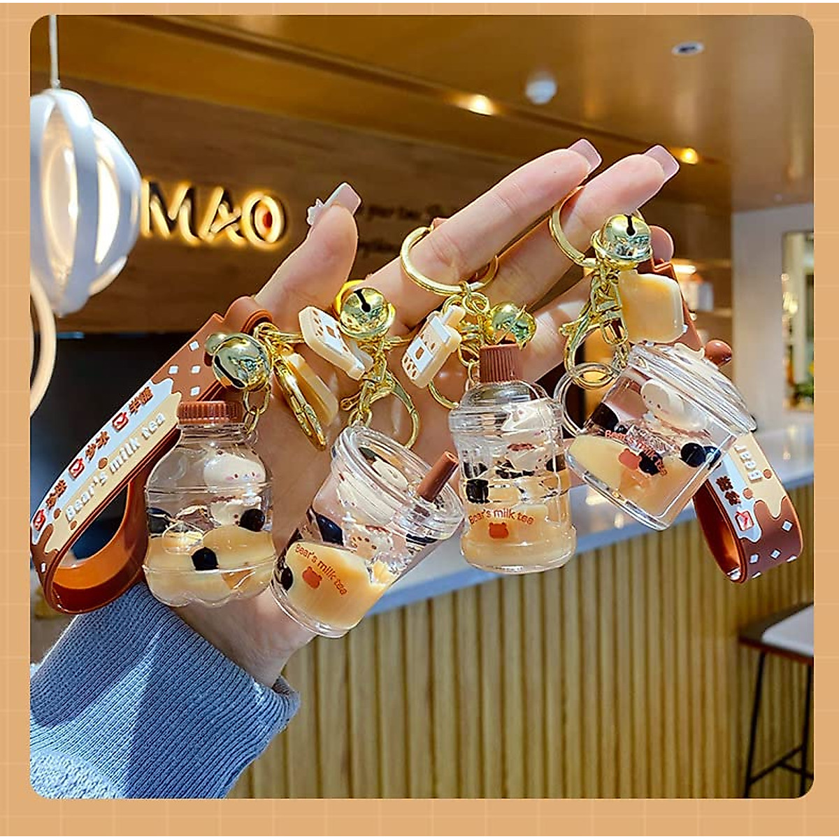 HSYHERE Men Women Creative Interesting Floating Milk Tea Brown Bear Lucky Bottle Keychain Keyrings. Bubble Tea Bear Moving Liquid Sand Car Key Chain Bag Pendant Decoration Holder - Cup.