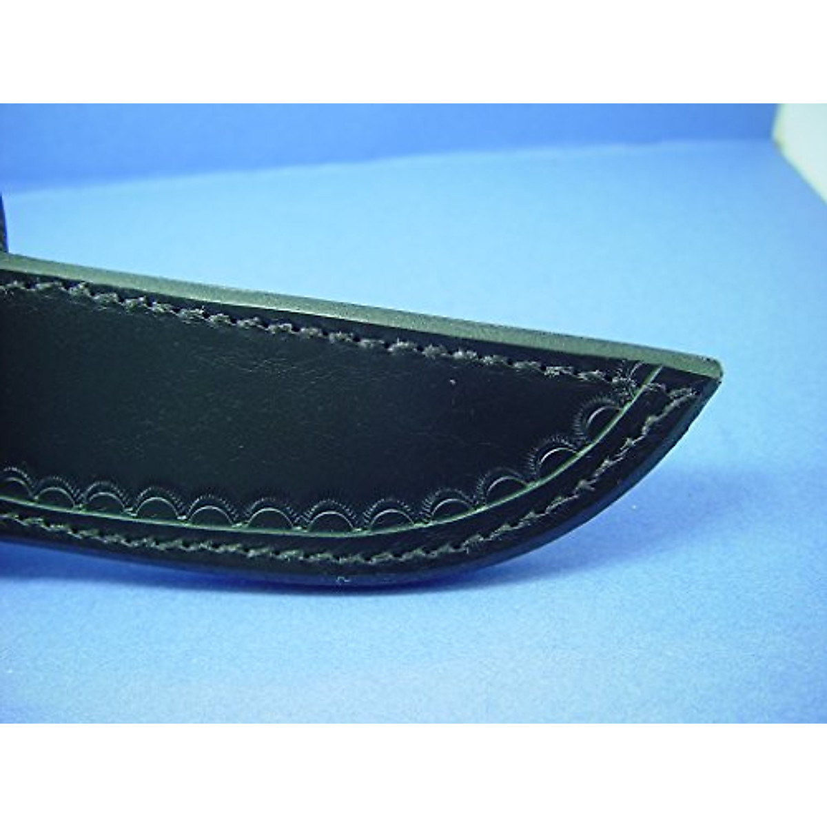 Custom Cross Draw Knife Sheath for the Buck 120 Knife. The Sheath Is Made Out of 10 Ounce Water Buffalo Hide Leather. The Water Buffalo Leather Is Very Soft Durable and Pliable. The Sheath Can Be Worn on the Right or Left Hand Side. It Has a Snap to Secur