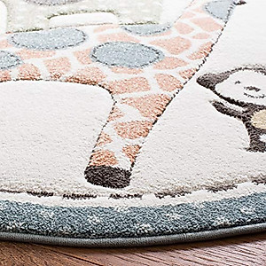 SAFAVIEH Carousel Kids Collection Area Rug - 5'3" Round, Ivory, Animal Design, Non-Shedding & Easy Care, Ideal for High Traffic Areas for Boys & Girls in Playroom, Nursery, Bedroom (CRK120A)