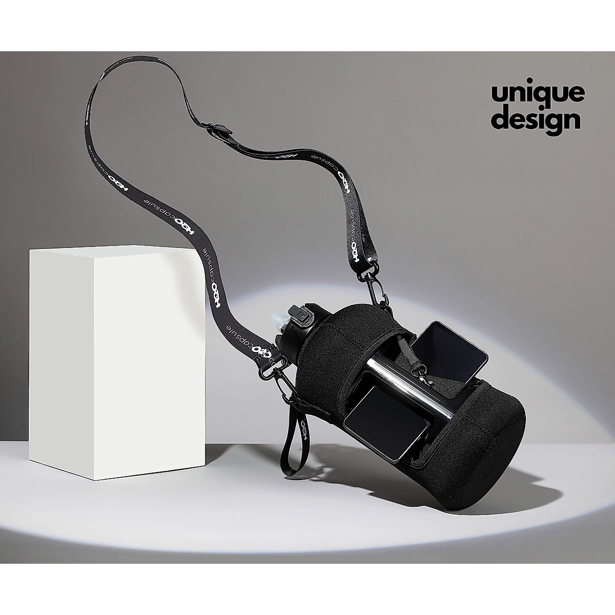 H2O Capsule 2.2L Half Gallon Water Bottle with Storage Sleeve and Covered Straw Lid – BPA Free Large Reusable Drink Container with Handle - Big Sports Jug, 2.2 Liter (74 Ounce) Jet Black