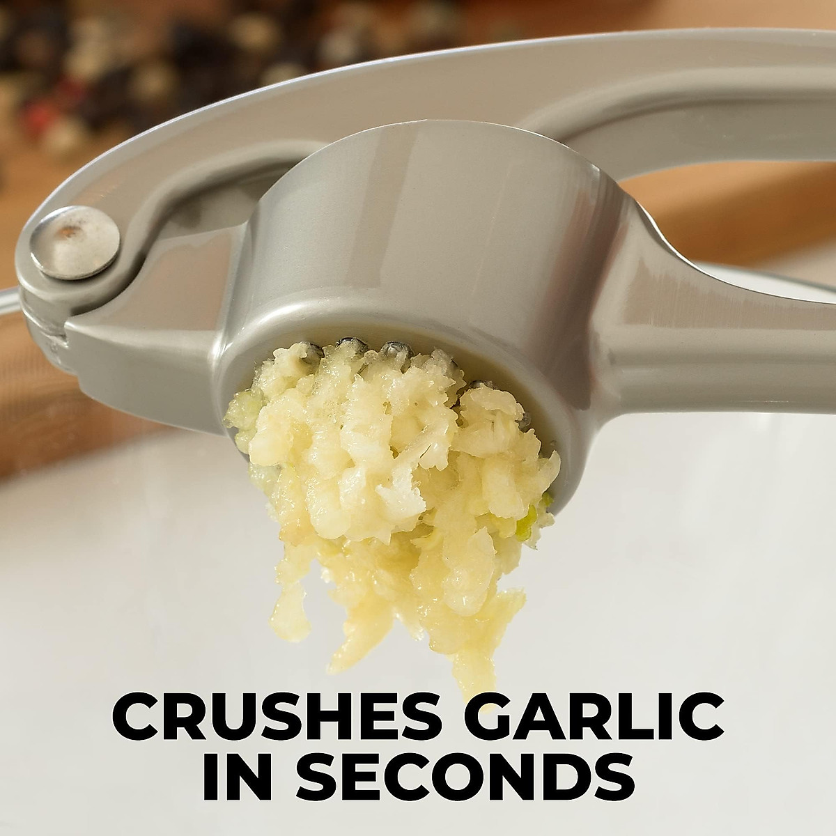 Zulay Kitchen Garlic Press With Soft, Easy To Squeeze Ergonomic Handle - Garlic Mincer Tool With Sturdy Design Extracts More Garlic Paste - Easy To Clean Garlic Crusher And Ginger Press (Silver)