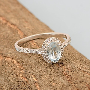 925 Sterling Silver Oval 1.25 Ctw Aquamarine Gemstone Women's Solitaire White Accents Engagement Ring Size_7