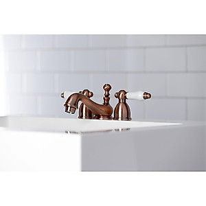 Kingston Brass KS3955PL Restoration Mini Widespread Lavatory Faucet with Porcelain Lever Handle, Oil Rubbed Bronze