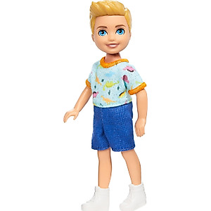 Barbie Chelsea Doll, Small Boy Doll Wearing Removable One-Piece with Dinosaur Print & White Shoes, Blond Hair & Blue Eyes