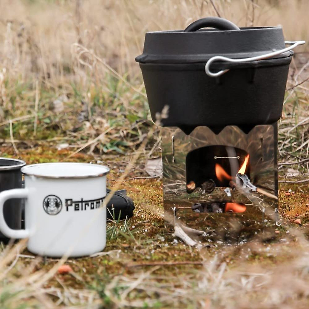 Petromax Cast Iron Dutch Oven for Cooking or Baking Outdoors Over a Campfire or in the Home Kitchen, Pre-Seasoned Cookware Conducts Heat Evenly, Flat Base, 1 Qt