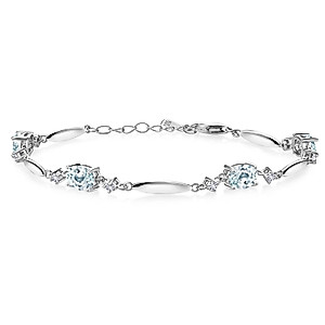 Gem Stone King 925 Sterling Silver Sky Blue Aquamarine and White Created Sapphire Tennis Bracelet For Women | 3.32 Cttw | Gemstone March Birthstone | Oval 7X5MM | 6 Inch + 1 Inch Extender