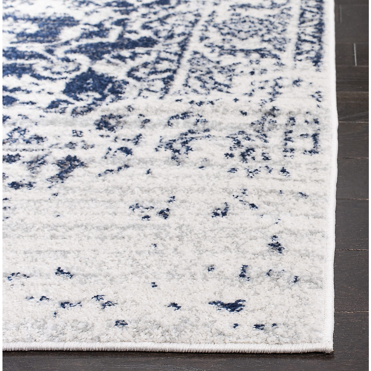 SAFAVIEH Madison Collection Area Rug - 6'7" x 9'2", Cream & Navy, Snowflake Medallion Distressed Design, Non-Shedding & Easy Care, Ideal for High Traffic Areas in Living Room, Bedroom (MAD603D)