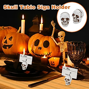AHANDMAKER 3 pcs Skull Table Card Holder Clip for Cards on The Table Top Resin Skull Table Number Holder, Spooky Desktop for Party Graveyard Halloween Decoration