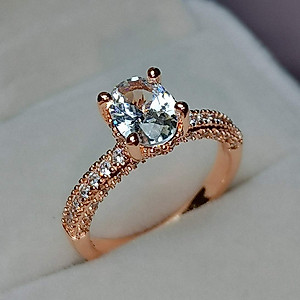 XIALV Rose Gold Plated Cubic Zirconia 2 Carats Oval Cut Ring Simulated Diamond CZ Wedding Engagement Ring for Women (US size 10)