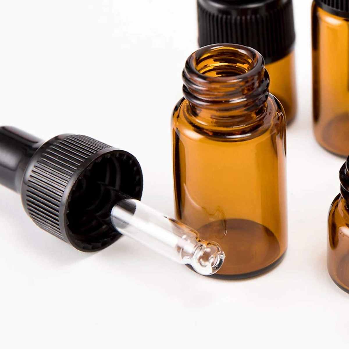 ConStore 100pcs Amber Glass Dropper Bottle Small Essential Oil Bottle with Glass Eye Dropper Empty Mini Lotion Dropper Vials Refillable Perfume Sample Vial Containers+2pcs dropper (1ml)