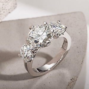 CannyCat 3 Stone Moissanite Ring for Women 5 cttw 3 carat Certified Moissanite with Side 1 carat D-color VVS Brilliant Platinum-Plated Silver Anniversary Engagement Wide Band (6.5)