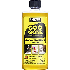 Goo Gone Original - 2 Ounce - Surface Safe Adhesive Remover Safely Removes Stickers Labels Decals Residue Tape Chewing Gum Grease Tar