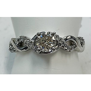 Houston Diamond District 0.63 Carat Twisting Infinity Gold and Diamond Split Shank Pave Set Diamond Engagement Ring, 14K Black Gold with a 0.5 Carat J-K I2 Round Brilliant Cut/Shape Center