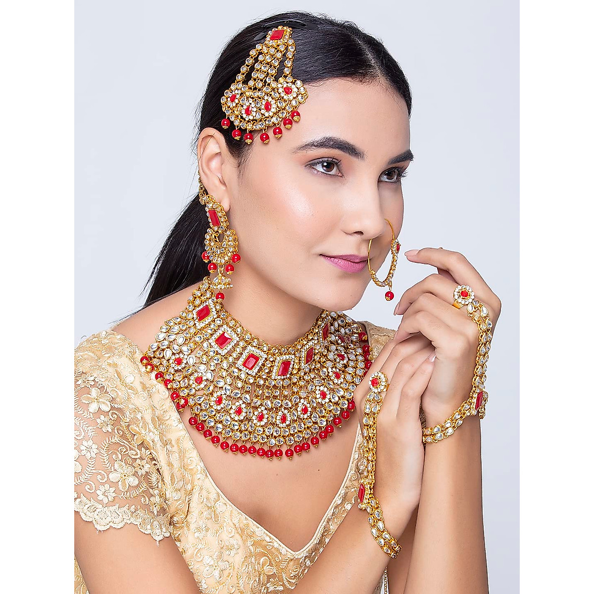 Steorra jewels Traditional Wedding Indian Bollywood Bridal Jewelry Set | Red Long Choker | Necklace, Earrings, Maang Tikka, Nath Paasa & Hath Phool in Faux Kundan Beads