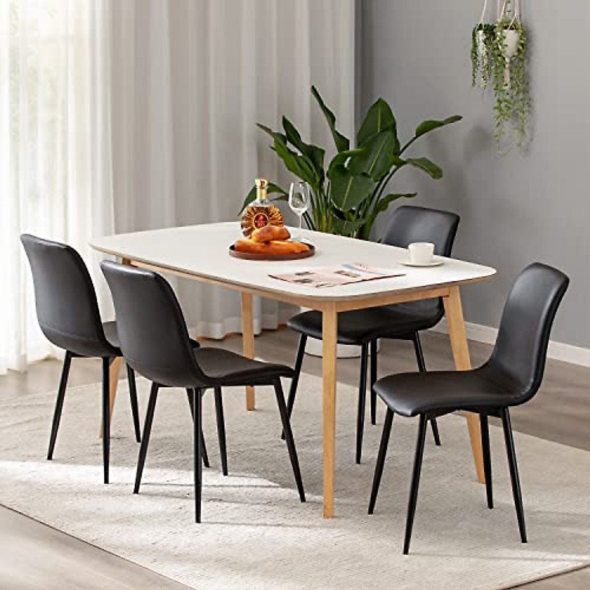 HeuGah Dining Chairs Set of 4, Black Modern Kitchen & Dining Room Chairs with Metal Legs, Industrial Faux Leather Kitchen Chairs