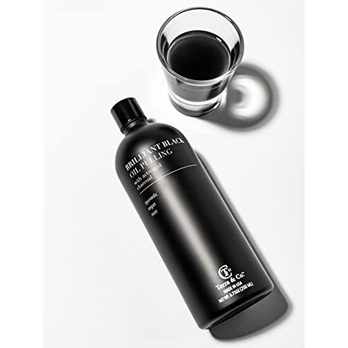 Brilliant Black Oil Pulling, Natural Ayurvedic Blend of Activated Charcoal and Coconut Oil, Oil Pulling Mouthwash Rinse with Peppermint Essential Oil - Terra & Co.