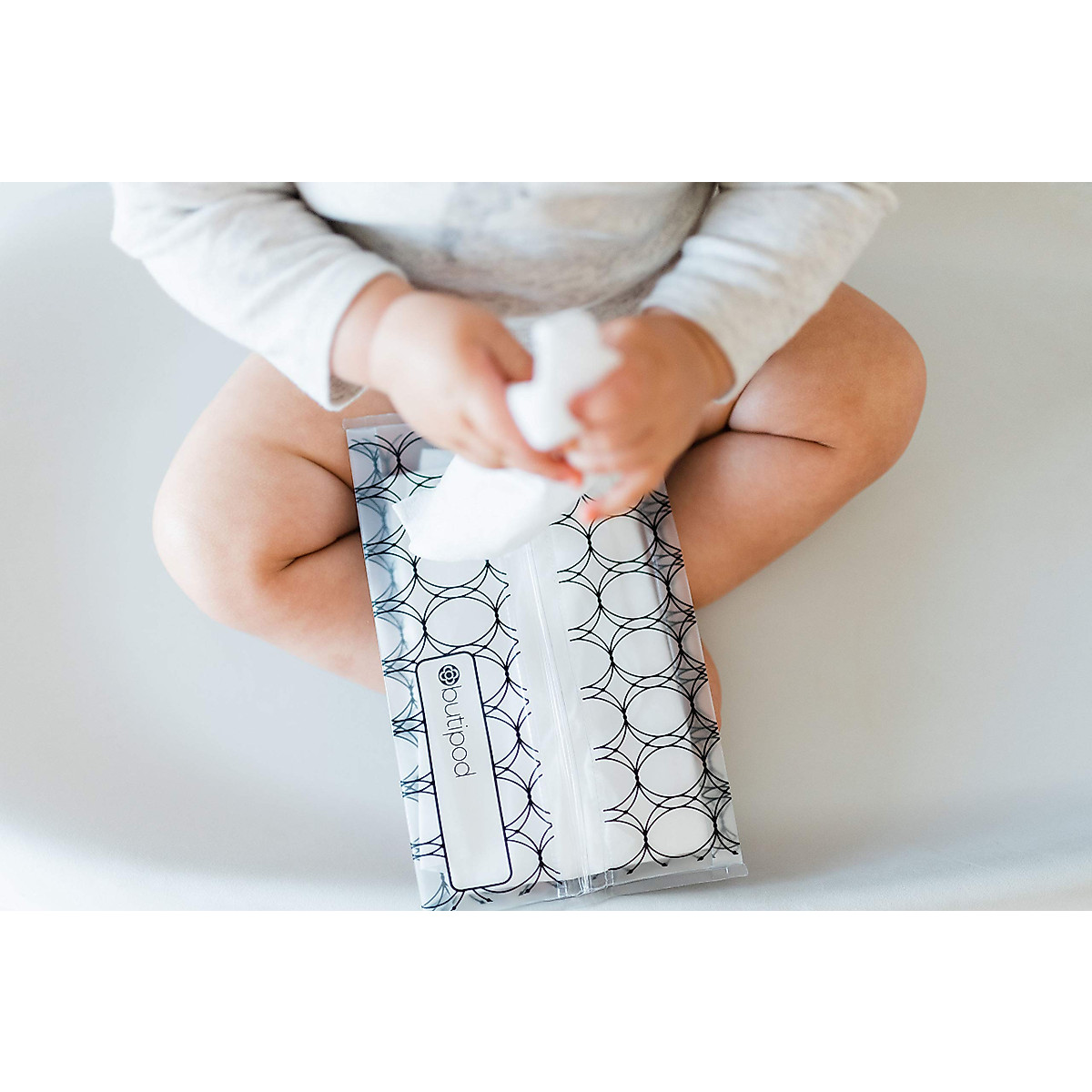 Butipods Reusable Wet Wipe Pouch Slim Case Travel Clutch Holder | Refillable Portable Baby Wipes Dispenser Container | Wipes Stay Moist | Great for Hand and Face Wipes, Set of 2 (Black Ovals & Rings)