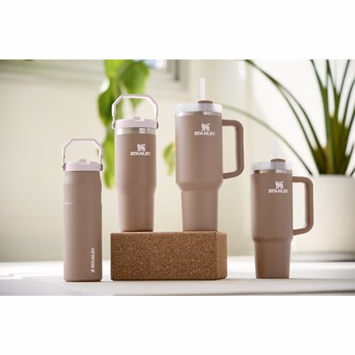 Stanley Quencher H2.0 Tumbler with Handle and Straw 30 oz | Flowstate 3-Position Lid | Cup Holder Compatible for Travel | Insulated Stainless Steel Cup | BPA-Free | Almond Rose