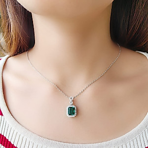 DovEggs Elongated Emerald Cut Moissanite Pendant for Women Center 3ct 7x9mm Zambia Emerald Halo Infinity Pendant Necklace with Moissanite Accents 14K Gold QUALITY Sterling Silver