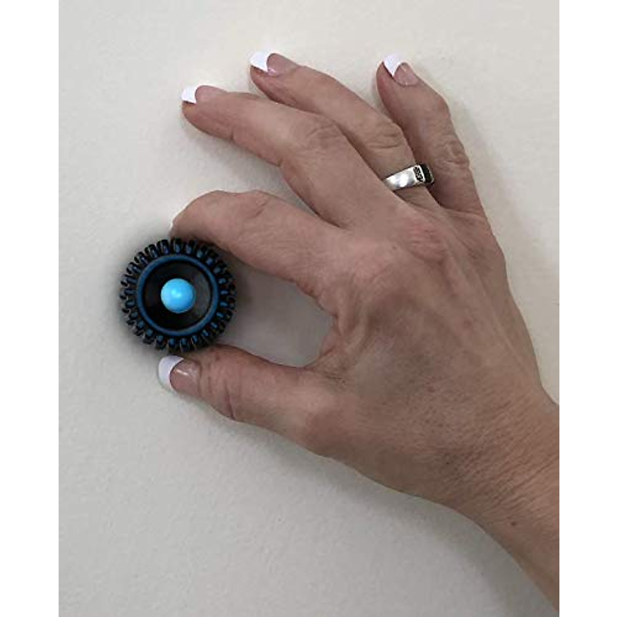 StudPoP Grip Magnetic Stud Finder. Finds Metal Fasteners Holding The Wall Board to The Studs. 3/4" diam Moving Magnet Gives an Audible Click and Visual Movement When Fastener is Found.