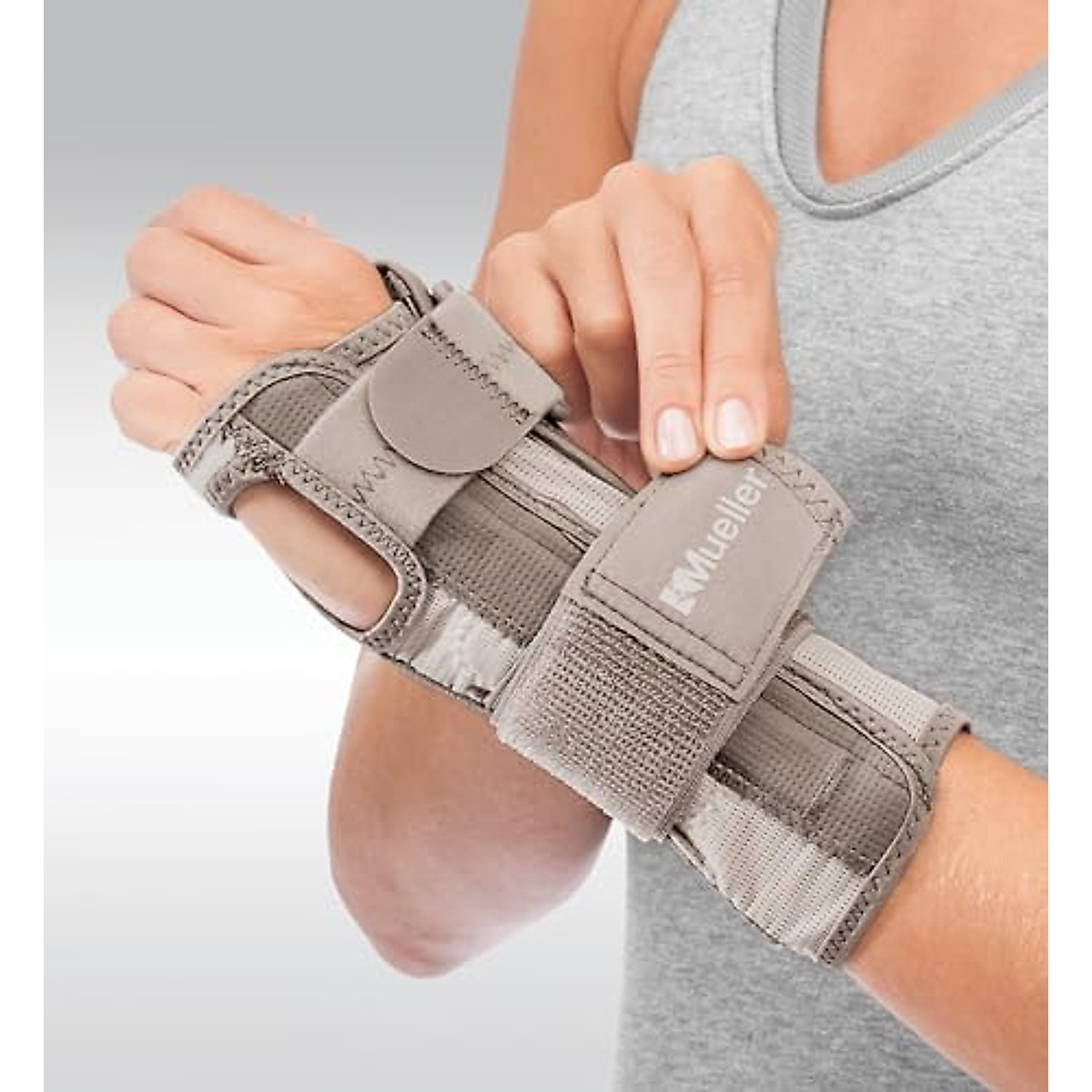 MUELLER Sports Medicine Reversible Wrist Stabilizer with Splint for Men and Women - Compression Wrist Support for Carpal Tunnel, Arthritis, Tendinitis Relief, Taupe, Small/Medium
