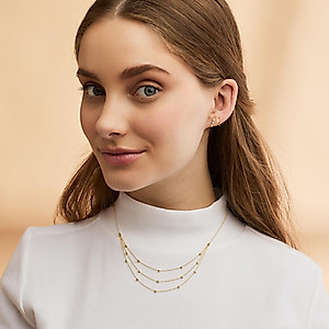 RS Pure by Ross-Simons Baguette Diamond-Accented Huggie Hoop Earrings in 14kt Yellow Gold