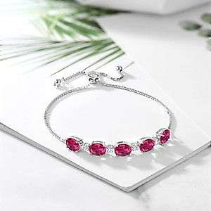 Gem Stone King 925 Sterling Silver Red Created Ruby and White Lab Grown Diamond Tennis Bracelet For Women (7.76 Cttw, Oval Center Stone:8X6MM, Small Stones: 2.5MM)