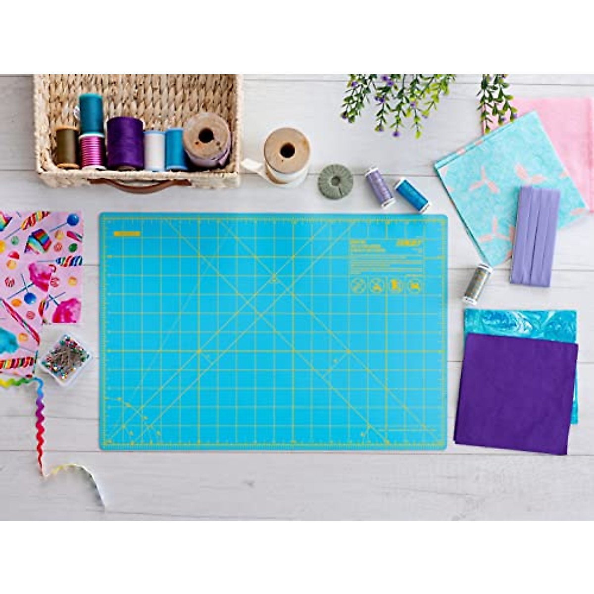OLFA 12" x 18" Self Healing Rotary Cutting Mat (RM-CG/AQA) - Double Sided 12x18 Inch Cutting Mat with Grid for Fabric, Sewing, Quilting, & Crafts, Designed for Use with Rotary Cutters (Aqua)