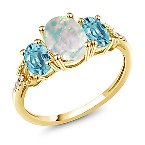 Gem Stone King 10K Yellow Gold Oval Cabochon White Simulated Opal and Blue Zircon Women Ring (2.34 Cttw) (Size 7)