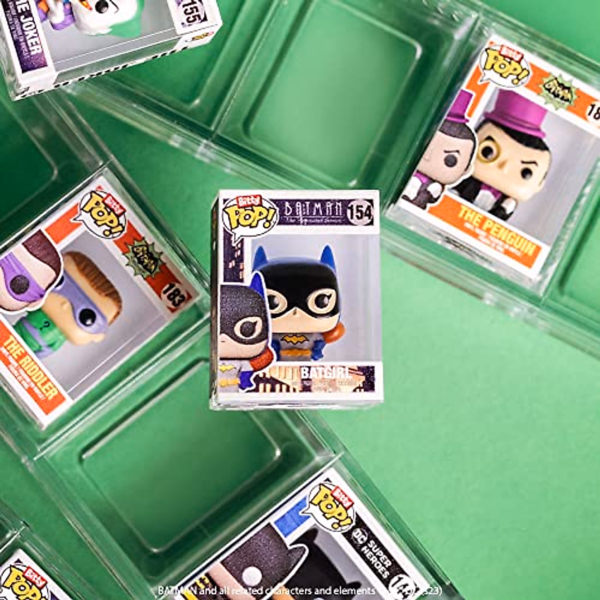 Funko Bitty POP! DC - Batgirl, 4-Pack - Batman, Batgirl, The Riddler and A Surprise Mystery Mini Figure - 0.9 Inch (2.2 Cm) - DC Comics Collectable - Stackable Display Shelf Included - Gift Idea
