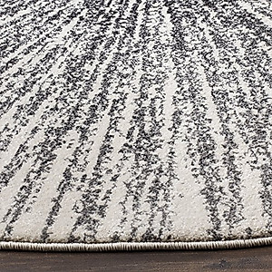 SAFAVIEH Evoke Collection Area Rug - 8' Round, Black & Ivory, Abstract Burst Design, Non-Shedding & Easy Care, Ideal for High Traffic Areas in Living Room, Bedroom (EVK228K)