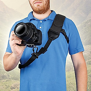 USA GEAR Camera Sling Shoulder Strap with Adjustable Neoprene, Safety Tether, Accessory Pocket, Quick Release Buckle - Compatible with Canon, Nikon, Sony and More DSLR and Mirrorless Cameras (Black)