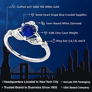 Gem Stone King 10K White Gold Blue Created Sapphire and White Diamond Irish Celtic Claddagh Ring For Women (0.86 Cttw, Heart Shape 6MM, Gemstone Birthstone, Available in size 5, 6, 7, 8, 9)