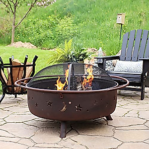 Sunnydaze Cosmic 42-Inch Wood-Burning Steel Fire Pit with Round Spark Screen, Poker, and Built-in Grate - Rust Patina