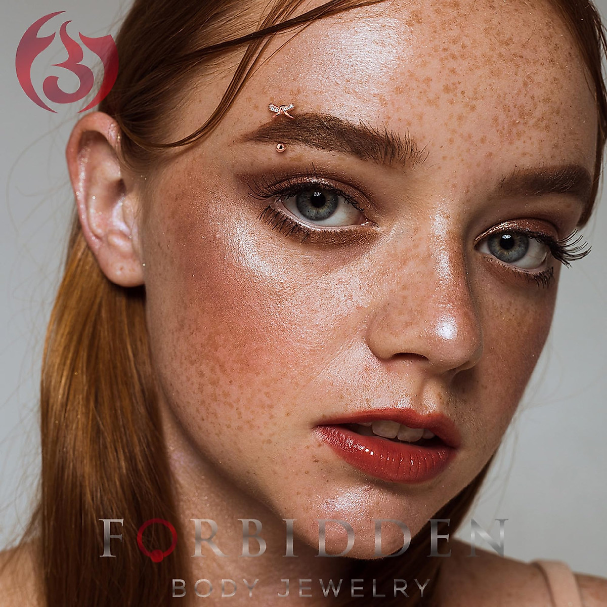 Forbidden Body Jewelry 16g 8mm Curved Barbell for Daith, Eyebrow, Rook & Belly Button with CZ Ribbon Tied Top, Clear/Gold Tone