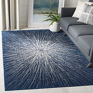 SAFAVIEH Evoke Collection Area Rug - 9' x 12', Navy & Ivory, Abstract Burst Design, Non-Shedding & Easy Care, Ideal for High Traffic Areas in Living Room, Bedroom (EVK228N)