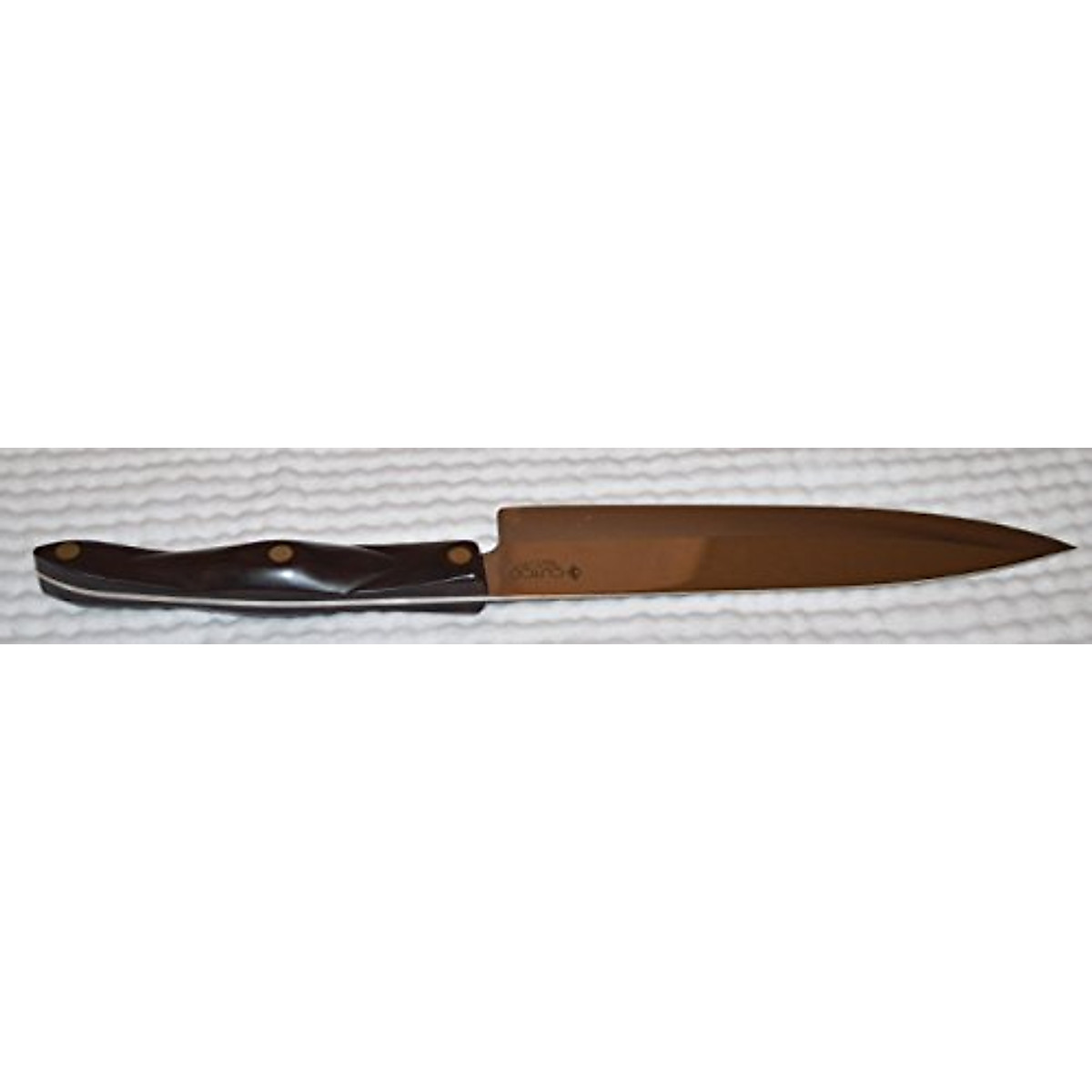 CUTCO Model 1728 Petite Chef Knife with 7 3/4" High Carbon Stainless blade and 5 1/2" classic dark brown handle (often called "black") in factory-sealed plastic bag.