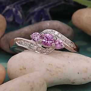 Dazzlingrock Collection 14K Round Pink Sapphire & White Diamond Swirl Engagement 3 Stone Bridal Ring, White Gold, Size 7.5