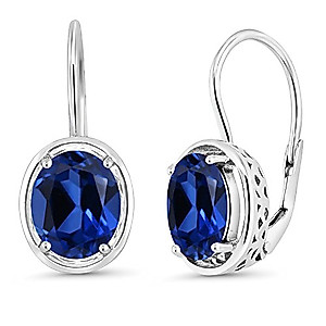 Gem Stone King 925 Sterling Silver Blue Created Sapphire Dangle Earrings For Women (4.60 Cttw, Oval 9X7MM)