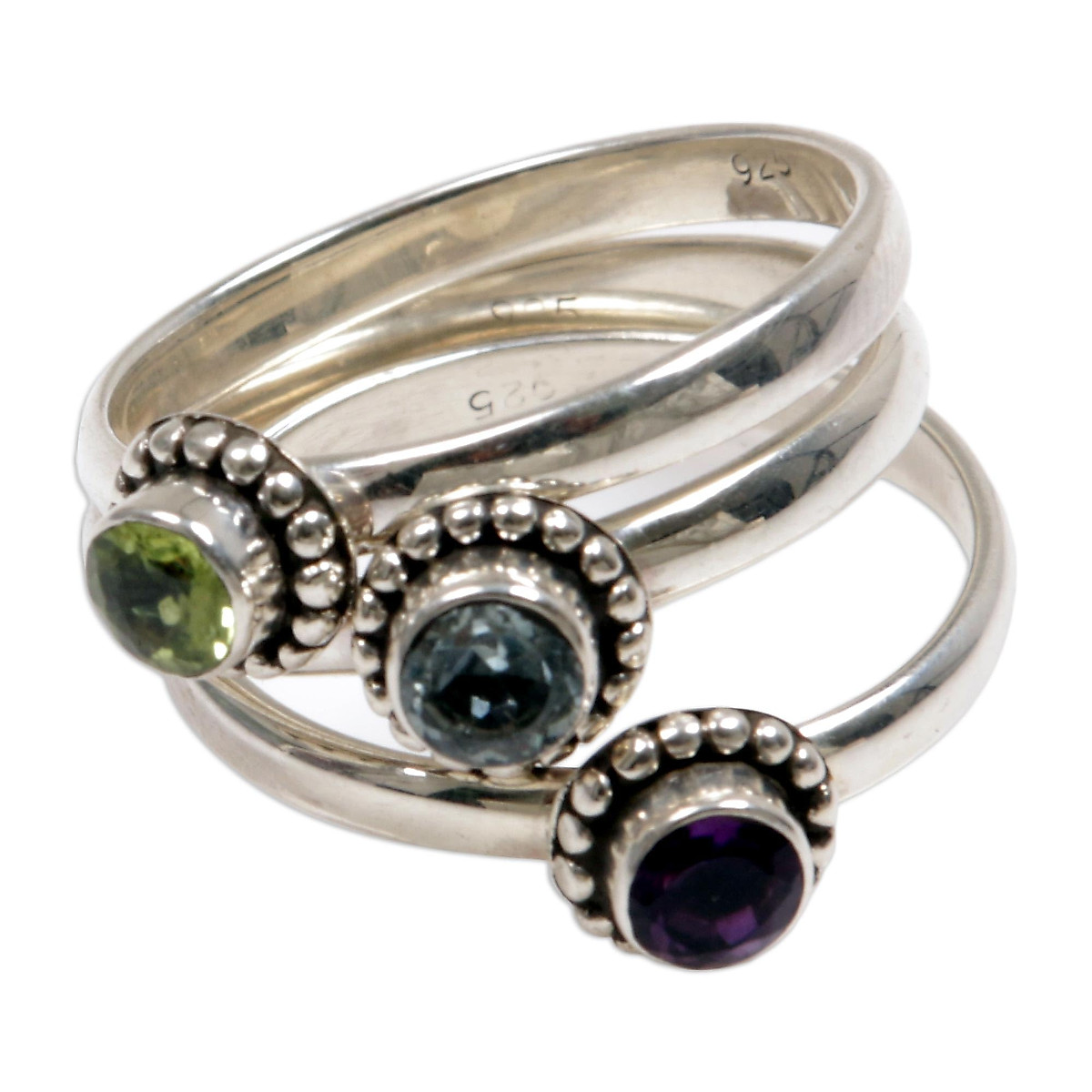 NOVICA Artisan Handmade Multigemstone Stacking Rings Sterling Silver Set of 3 Amethyst Blue Topaz Peridot Green Purple Multicolor Indonesia Modern Birthstone [crownbezel 0.2 in H x 0.2 in Diam. Band ]
