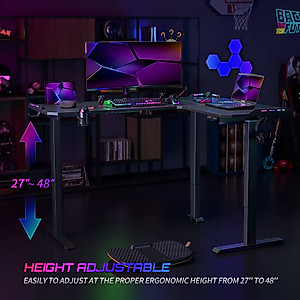 FEZIBO 63 Inch L Shaped Gaming Standing Desk, Electric Height Adjustable Gaming Desk with Triple Motors, Corner Stand up Desk with Cup Holder, Black Frame/Carbon Fiber Top