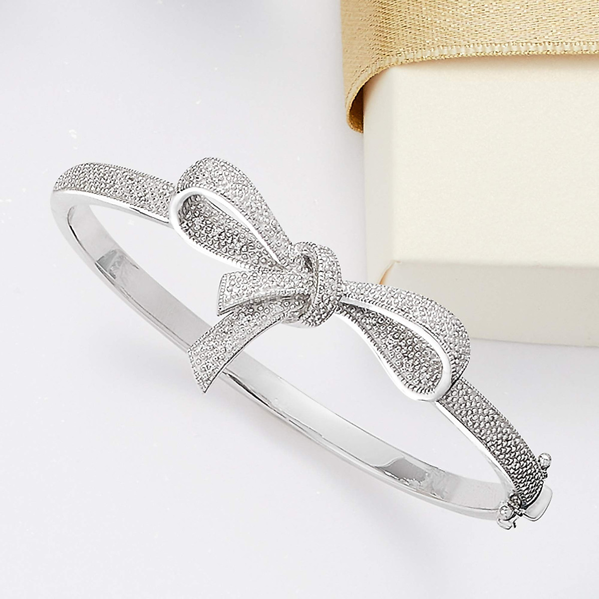 Ross-Simons 0.15 ct. t.w. Diamond Bow Bangle Bracelet in Sterling Silver. 8 inches
