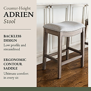 Maven Lane Adrien 26 Inch Counter Height Upholstered Backless Saddle Barstool in Reclaimed Oak Finish with Ash Grey Fabric Cushion Seat, Set of 3