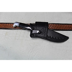 Buck 119 Cross Draw Knife Sheath. This Sheath Is Made Out of 8 Ounce Leather the Leather Is Very Soft Durable and Pliable You Will Not Need to Line Your Sheath for Your Finer Knives. The Leather Is Dyed Black with Border Tooling. The Sheath Can Be Worn on