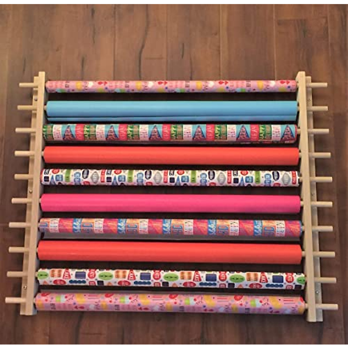 Storage Station, Organizer, Dispensing Rack for Gift Wrapping Paper, Ribbons, Cellophane, Vinyl Rolls, Paper & Other Arts & Crafts Items. Holds 10 Rows. Adjustable Width. Easy Wall Mount. Hardware Included.